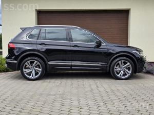 Black Volkswagen Tiguan 2022 in Riga, with an engine capacity of 1.40 L and mileage of 77 thousand km for 27950 €, photo 7 on AUTOMOTO.COM.LV