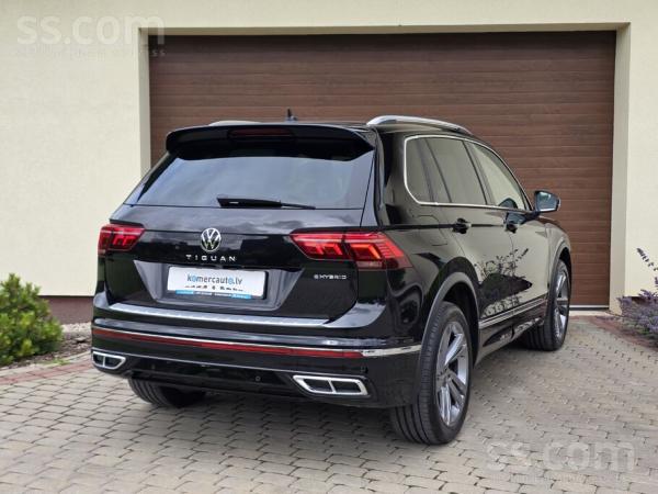 Black Volkswagen Tiguan 2022 in Riga, with an engine capacity of 1.40 L and mileage of 77 thousand km for 27950 €, photo 7 on AUTOMOTO.COM.LV