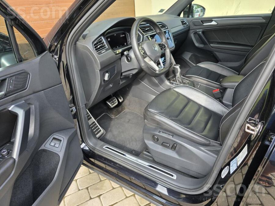 Black Volkswagen Tiguan 2022 in Riga, with an engine capacity of 1.40 L and mileage of 77 thousand km for 27950 €, photo 13 on AUTOMOTO.COM.LV