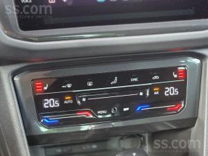 Black Volkswagen Tiguan 2022 in Riga, with an engine capacity of 1.40 L and mileage of 77 thousand km for 27950 €, photo 28 on AUTOMOTO.COM.LV