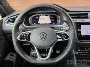 Black Volkswagen Tiguan 2022 in Riga, with an engine capacity of 1.40 L and mileage of 77 thousand km for 27950 €, photo 31 on AUTOMOTO.COM.LV