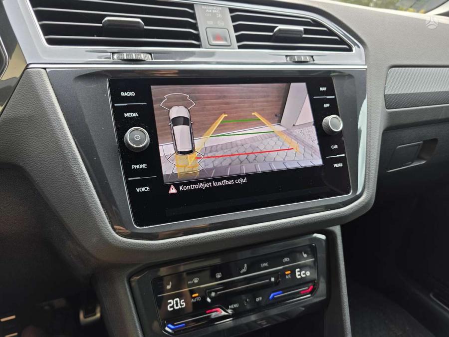 Black Volkswagen Tiguan 2022 in Riga, with an engine capacity of 1.40 L and mileage of 77 thousand km for 27950 €, photo 24 on AUTOMOTO.COM.LV