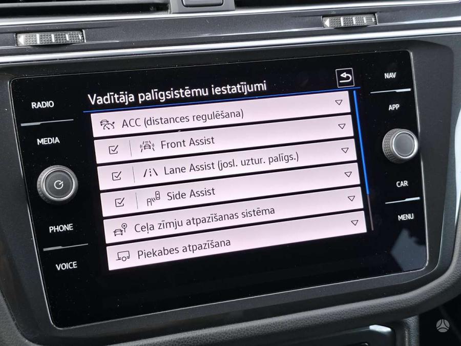 Black Volkswagen Tiguan 2022 in Riga, with an engine capacity of 1.40 L and mileage of 77 thousand km for 27950 €, photo 30 on AUTOMOTO.COM.LV