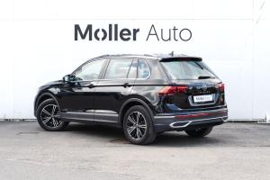 Black Volkswagen Tiguan 2022 in Riga, with an engine capacity of 1.40 L and mileage of 134 thousand km for 24500 €, photo 4 on AUTOMOTO.COM.LV