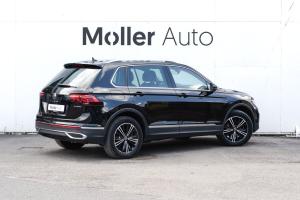 Black Volkswagen Tiguan 2022 in Riga, with an engine capacity of 1.40 L and mileage of 134 thousand km for 24500 €, photo 5 on AUTOMOTO.COM.LV