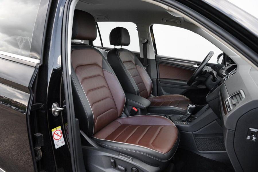Black Volkswagen Tiguan 2022 in Riga, with an engine capacity of 1.40 L and mileage of 134 thousand km for 24500 €, photo 8 on AUTOMOTO.COM.LV