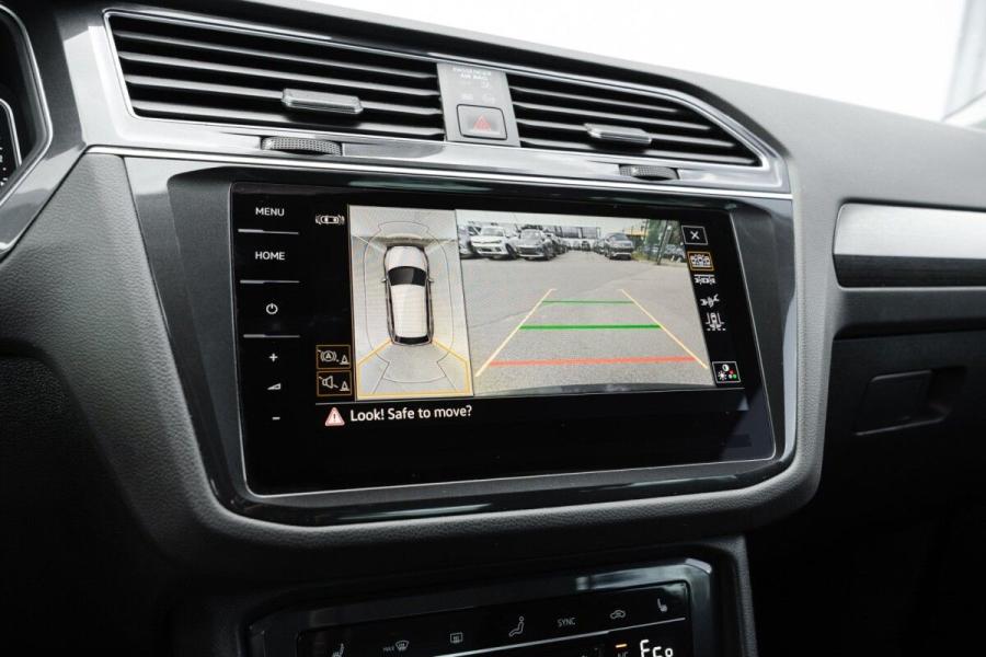 Black Volkswagen Tiguan 2022 in Riga, with an engine capacity of 1.40 L and mileage of 134 thousand km for 24500 €, photo 28 on AUTOMOTO.COM.LV