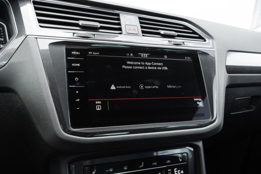 Black Volkswagen Tiguan 2022 in Riga, with an engine capacity of 1.40 L and mileage of 134 thousand km for 24500 €, photo 30 on AUTOMOTO.COM.LV