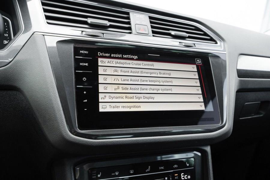 Black Volkswagen Tiguan 2022 in Riga, with an engine capacity of 1.40 L and mileage of 134 thousand km for 24500 €, photo 32 on AUTOMOTO.COM.LV