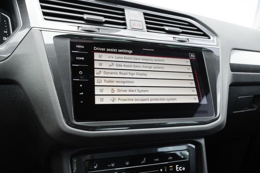 Black Volkswagen Tiguan 2022 in Riga, with an engine capacity of 1.40 L and mileage of 134 thousand km for 24500 €, photo 33 on AUTOMOTO.COM.LV