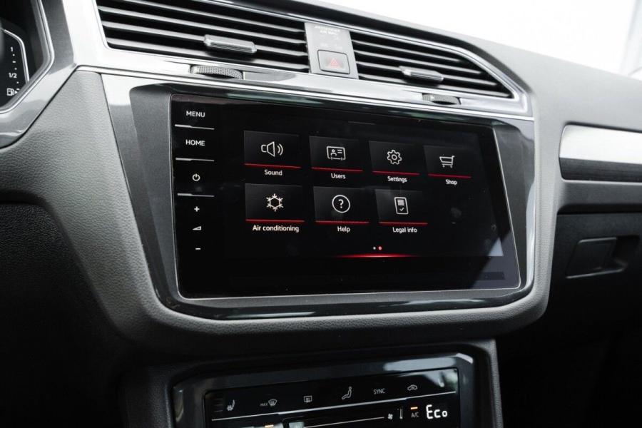 Black Volkswagen Tiguan 2022 in Riga, with an engine capacity of 1.40 L and mileage of 134 thousand km for 24500 €, photo 34 on AUTOMOTO.COM.LV
