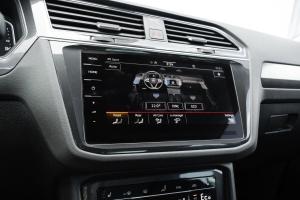 Black Volkswagen Tiguan 2022 in Riga, with an engine capacity of 1.40 L and mileage of 134 thousand km for 24500 €, photo 35 on AUTOMOTO.COM.LV
