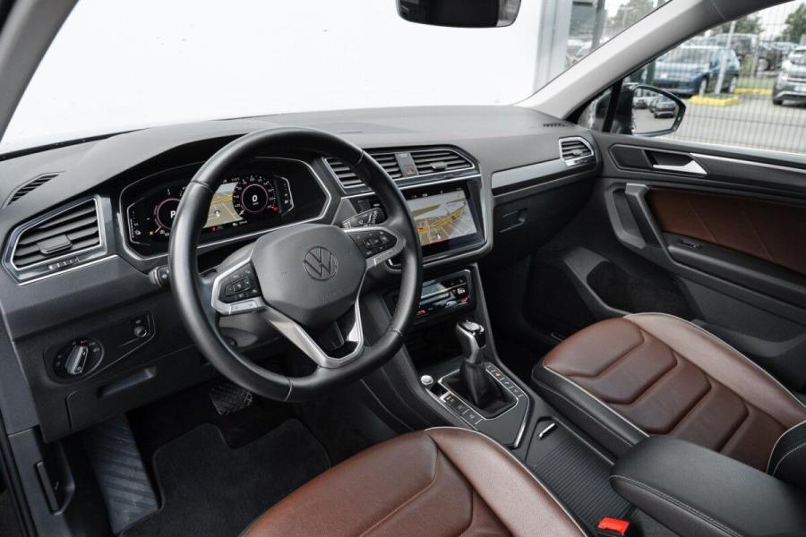 Black Volkswagen Tiguan 2022 in Riga, with an engine capacity of 1.40 L and mileage of 134 thousand km for 24500 €, photo 37 on AUTOMOTO.COM.LV
