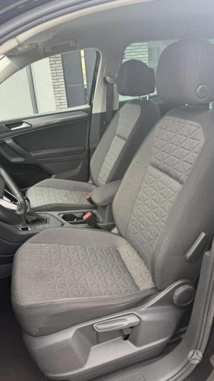 Black Volkswagen Tiguan 2022 in Vilnius, with an engine capacity of 1.40 L and mileage of 119 thousand km for 21990 €, photo 10 on AUTOMOTO.COM.LV
