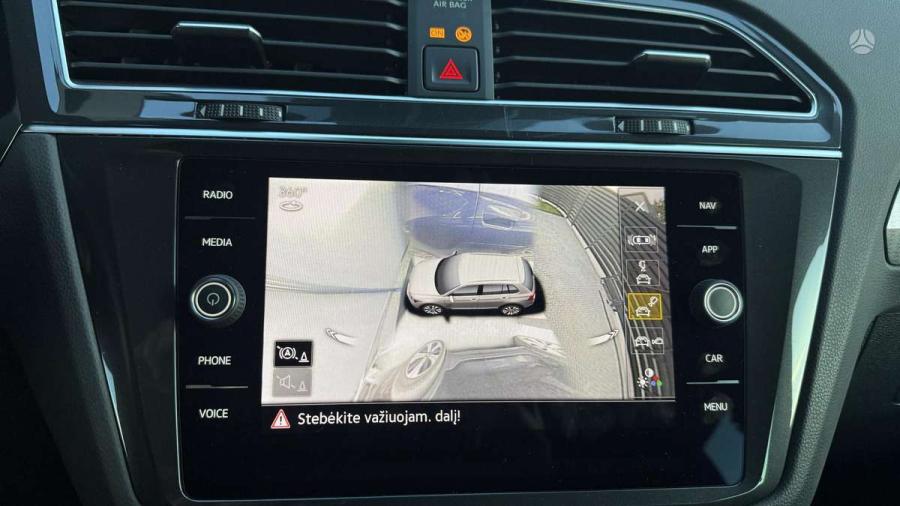 Black Volkswagen Tiguan 2022 in Vilnius, with an engine capacity of 1.40 L and mileage of 119 thousand km for 21990 €, photo 16 on AUTOMOTO.COM.LV