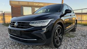 Black Volkswagen Tiguan 2023 in Vilnius, with an engine capacity of 1.50 L and mileage of 144 thousand km for 21659 €, photo  on AUTOMOTO.COM.LV