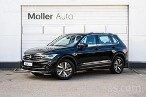 Black Volkswagen Tiguan 2023 in Riga, with an engine capacity of 1.40 L and mileage of 133 thousand km for 23450 €, photo  on AUTOMOTO.COM.LV