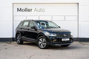 Black Volkswagen Tiguan 2023 in Riga, with an engine capacity of 1.40 L and mileage of 133 thousand km for 23450 €, photo 3 on AUTOMOTO.COM.LV