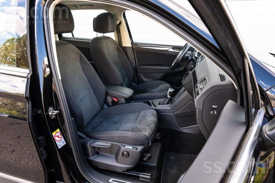 Black Volkswagen Tiguan 2023 in Riga, with an engine capacity of 1.40 L and mileage of 133 thousand km for 23450 €, photo 8 on AUTOMOTO.COM.LV