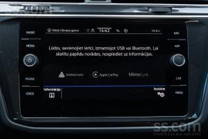 Black Volkswagen Tiguan 2023 in Riga, with an engine capacity of 1.40 L and mileage of 133 thousand km for 23450 €, photo 14 on AUTOMOTO.COM.LV