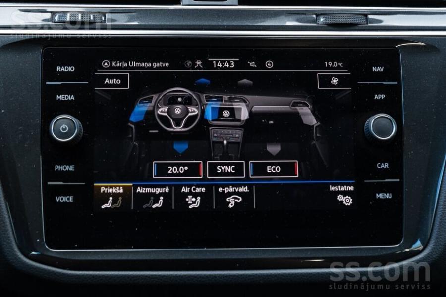 Black Volkswagen Tiguan 2023 in Riga, with an engine capacity of 1.40 L and mileage of 133 thousand km for 23450 €, photo 15 on AUTOMOTO.COM.LV