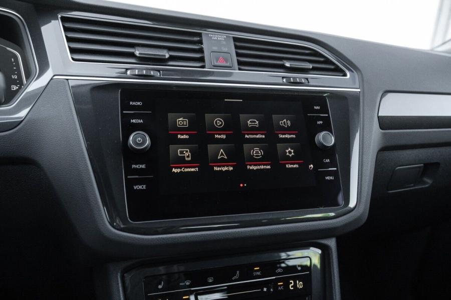 Black Volkswagen Tiguan 2023 in Riga, with an engine capacity of 1.50 L and mileage of 61 thousand km for 24950 €, photo 23 on AUTOMOTO.COM.LV