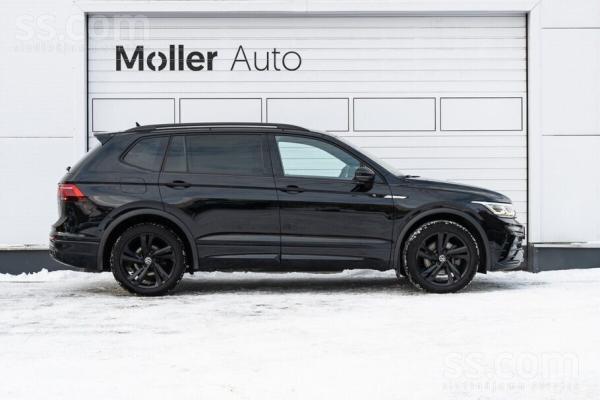 Black Volkswagen Tiguan 2024 in Riga, with an engine capacity of 2.00 L and mileage of 94 thousand km for 36950 €, photo 5 on AUTOMOTO.COM.LV