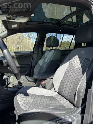Black Volkswagen Tiguan 2024 in Riga, with an engine capacity of 2.00 L and mileage of 48 thousand km for 35400 €, photo 10 on AUTOMOTO.COM.LV