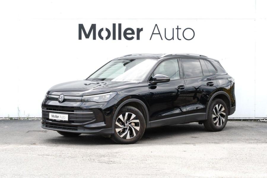 Melns Volkswagen Tiguan 2024 Rīga, ar dzinēja tilpumu 2.00 L un nobraukumu 21 tūkst. km par 32950 €, foto 1 vietnē AUTOMOTO.COM.LV