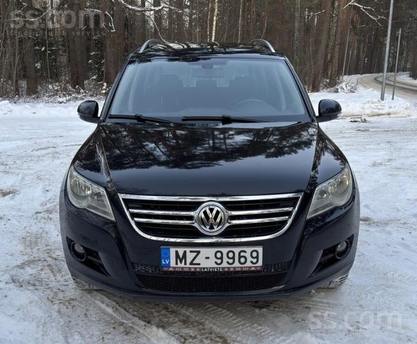 Black Volkswagen Tiguan 2008 in Riga, with an engine capacity of 2.00 L and mileage of 265 thousand km for 6650 €, photo 1 on AUTOMOTO.COM.LV