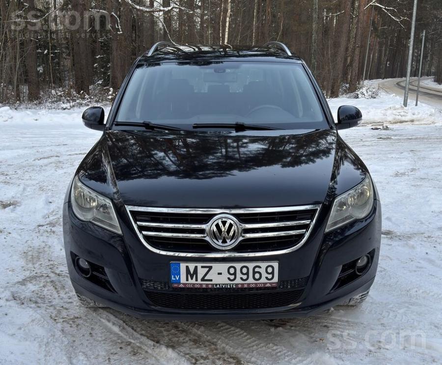 Black Volkswagen Tiguan 2008 in Riga, with an engine capacity of 2.00 L and mileage of 265 thousand km for 6650 €, photo 1 on AUTOMOTO.COM.LV