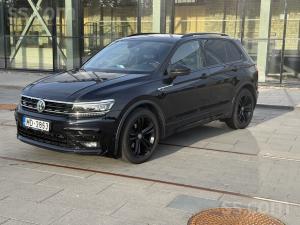 Black Volkswagen Tiguan 2019 in Riga, with an engine capacity of 2.00 L and mileage of 127 thousand km for 20500 €, photo  on AUTOMOTO.COM.LV