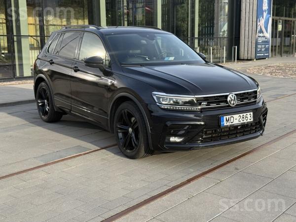 Black Volkswagen Tiguan 2019 in Riga, with an engine capacity of 2.00 L and mileage of 127 thousand km for 20500 €, photo 5 on AUTOMOTO.COM.LV