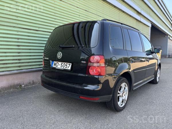 Black Volkswagen Tiguan 2008 in Riga, with an engine capacity of 1.40 L and mileage of 0 thousand km for 32300 €, photo 7 on AUTOMOTO.COM.LV