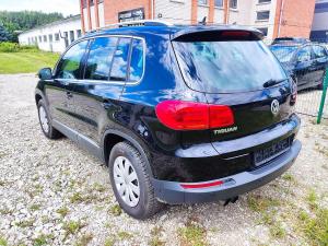 Black Volkswagen Tiguan 2012 in Prienai, with an engine capacity of 1.40 L and mileage of 202 thousand km for 6500 €, photo 5 on AUTOMOTO.COM.LV