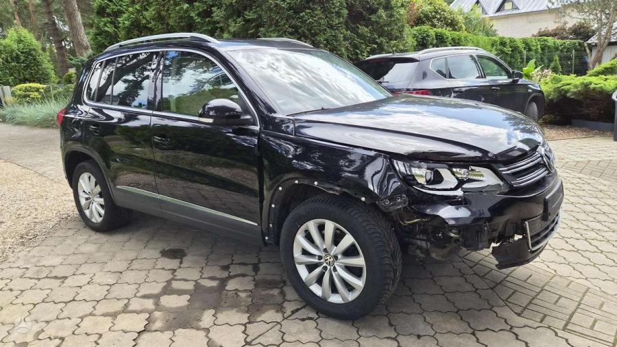 Melns Volkswagen Tiguan 2013 Kauņa, ar dzinēja tilpumu 2.00 L un nobraukumu 150 tūkst. km par 4500 €, foto 1 vietnē AUTOMOTO.COM.LV