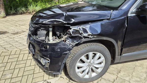 Black Volkswagen Tiguan 2013 in Kaunas, with an engine capacity of 2.00 L and mileage of 150 thousand km for 4500 €, photo 5 on AUTOMOTO.COM.LV