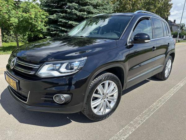 Black Volkswagen Tiguan 2014 in Kaunas, with an engine capacity of 2.00 L and mileage of 286 thousand km for 11200 €, photo 1 on AUTOMOTO.COM.LV