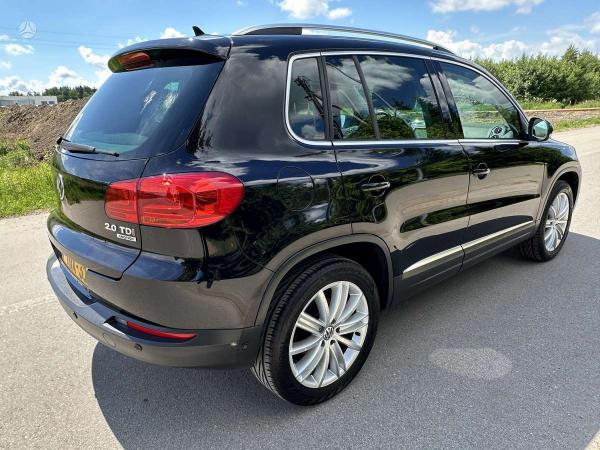 Black Volkswagen Tiguan 2014 in Kaunas, with an engine capacity of 2.00 L and mileage of 286 thousand km for 11200 €, photo 9 on AUTOMOTO.COM.LV
