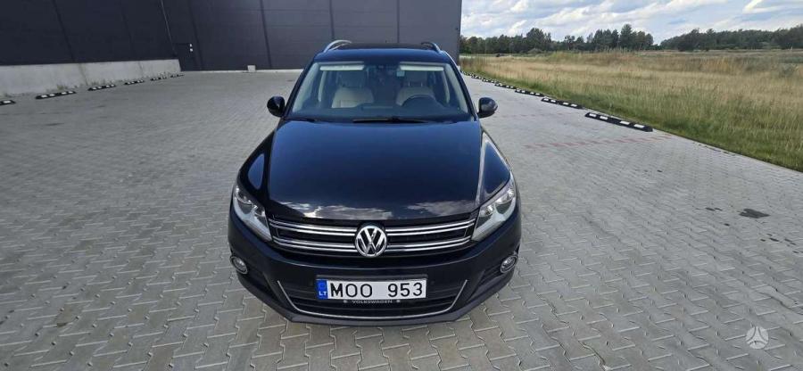 Black Volkswagen Tiguan 2015 in Siauliai, with an engine capacity of 1.97 L and mileage of 247 thousand km for 9450 €, photo 6 on AUTOMOTO.COM.LV