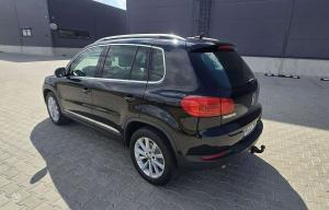 Black Volkswagen Tiguan 2015 in Siauliai, with an engine capacity of 1.97 L and mileage of 247 thousand km for 9450 €, photo 14 on AUTOMOTO.COM.LV