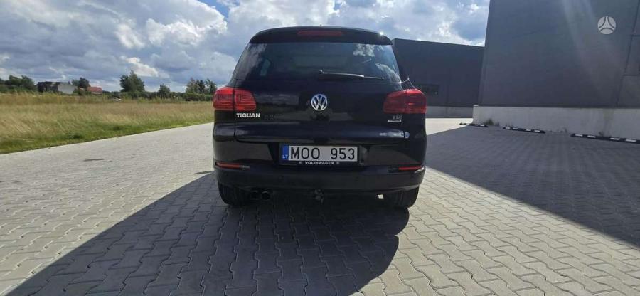 Black Volkswagen Tiguan 2015 in Siauliai, with an engine capacity of 1.97 L and mileage of 247 thousand km for 9450 €, photo 16 on AUTOMOTO.COM.LV