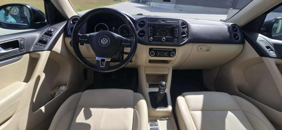 Black Volkswagen Tiguan 2015 in Siauliai, with an engine capacity of 1.97 L and mileage of 247 thousand km for 9450 €, photo 22 on AUTOMOTO.COM.LV