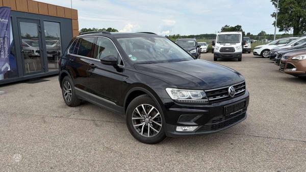 Black Volkswagen Tiguan 2017 in Marijampole, with an engine capacity of 2.00 L and mileage of 201 thousand km for 15650 €, photo 1 on AUTOMOTO.COM.LV