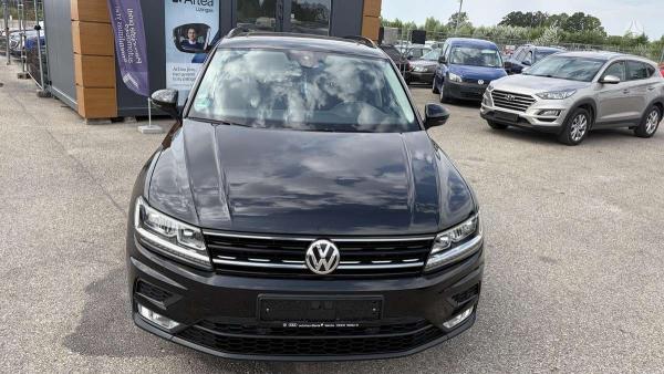 Black Volkswagen Tiguan 2017 in Marijampole, with an engine capacity of 2.00 L and mileage of 201 thousand km for 15100 €, photo 2 on AUTOMOTO.COM.LV