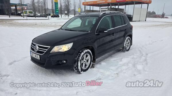 Black Volkswagen Tiguan 2008 in Tallinn, with an engine capacity of 2.00 L and mileage of 324 thousand km for 4499 €, photo 1 on AUTOMOTO.COM.LV