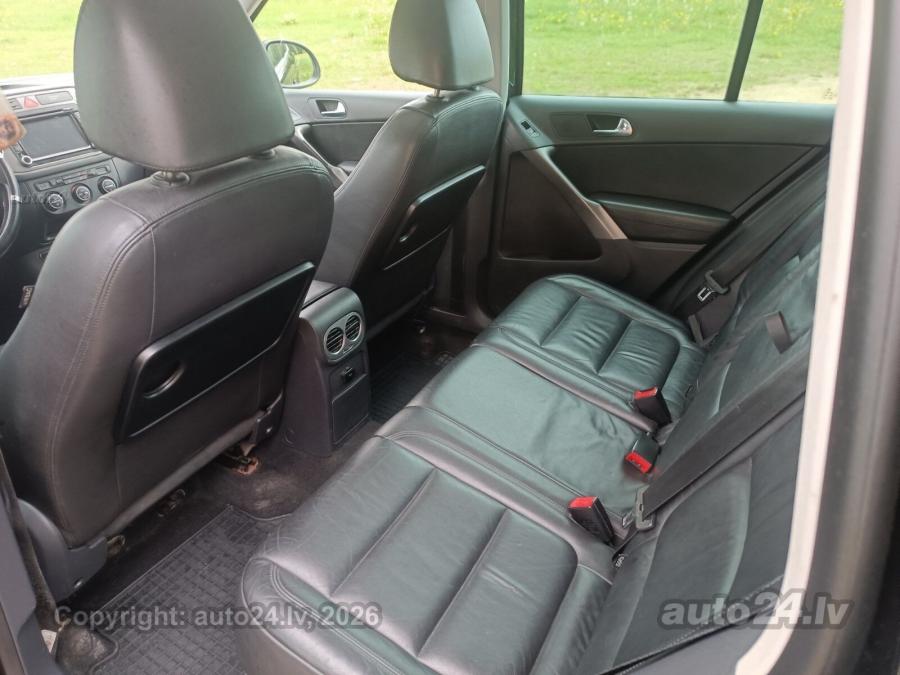 Black Volkswagen Tiguan 2008 in Tallinn, with an engine capacity of 2.00 L and mileage of 283 thousand km for 3699 €, photo 12 on AUTOMOTO.COM.LV