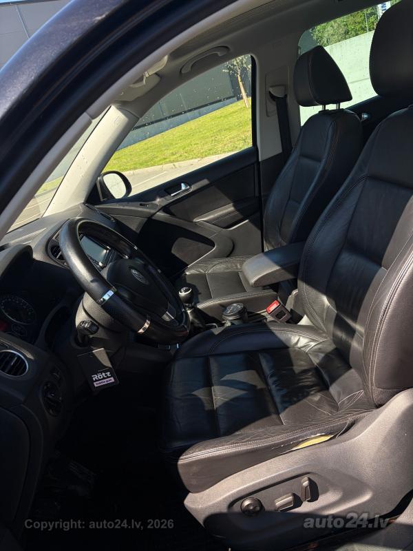 Black Volkswagen Tiguan 2008 in Tallinn, with an engine capacity of 2.00 L and mileage of 283 thousand km for 3690 €, photo 10 on AUTOMOTO.COM.LV