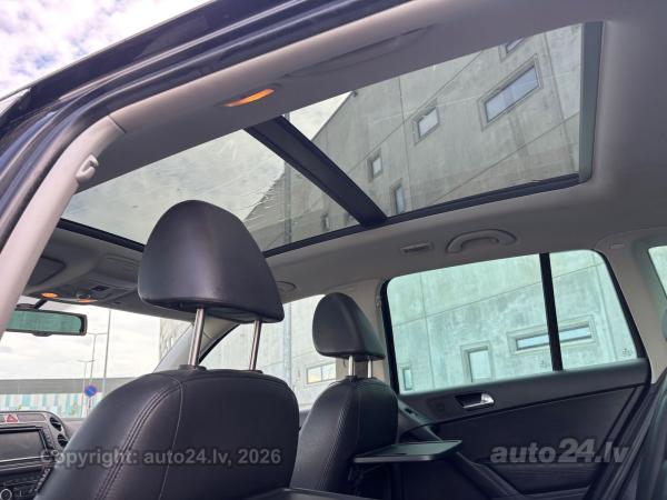 Black Volkswagen Tiguan 2009 in Tallinn, with an engine capacity of 2.00 L and mileage of 297 thousand km for 3699 €, photo 7 on AUTOMOTO.COM.LV