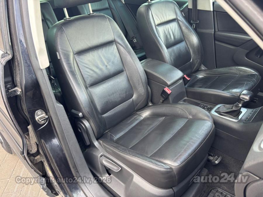Melns Volkswagen Tiguan 2009 Tallina, ar dzinēja tilpumu 2.00 L un nobraukumu 297 tūkst. km par 3699 €, foto 11 vietnē AUTOMOTO.COM.LV